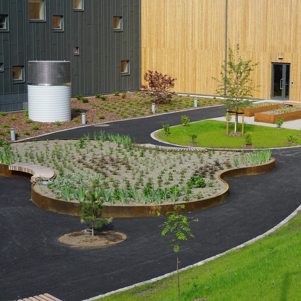 Seating and planters for nursing home's sensory garden | Streetlife ...