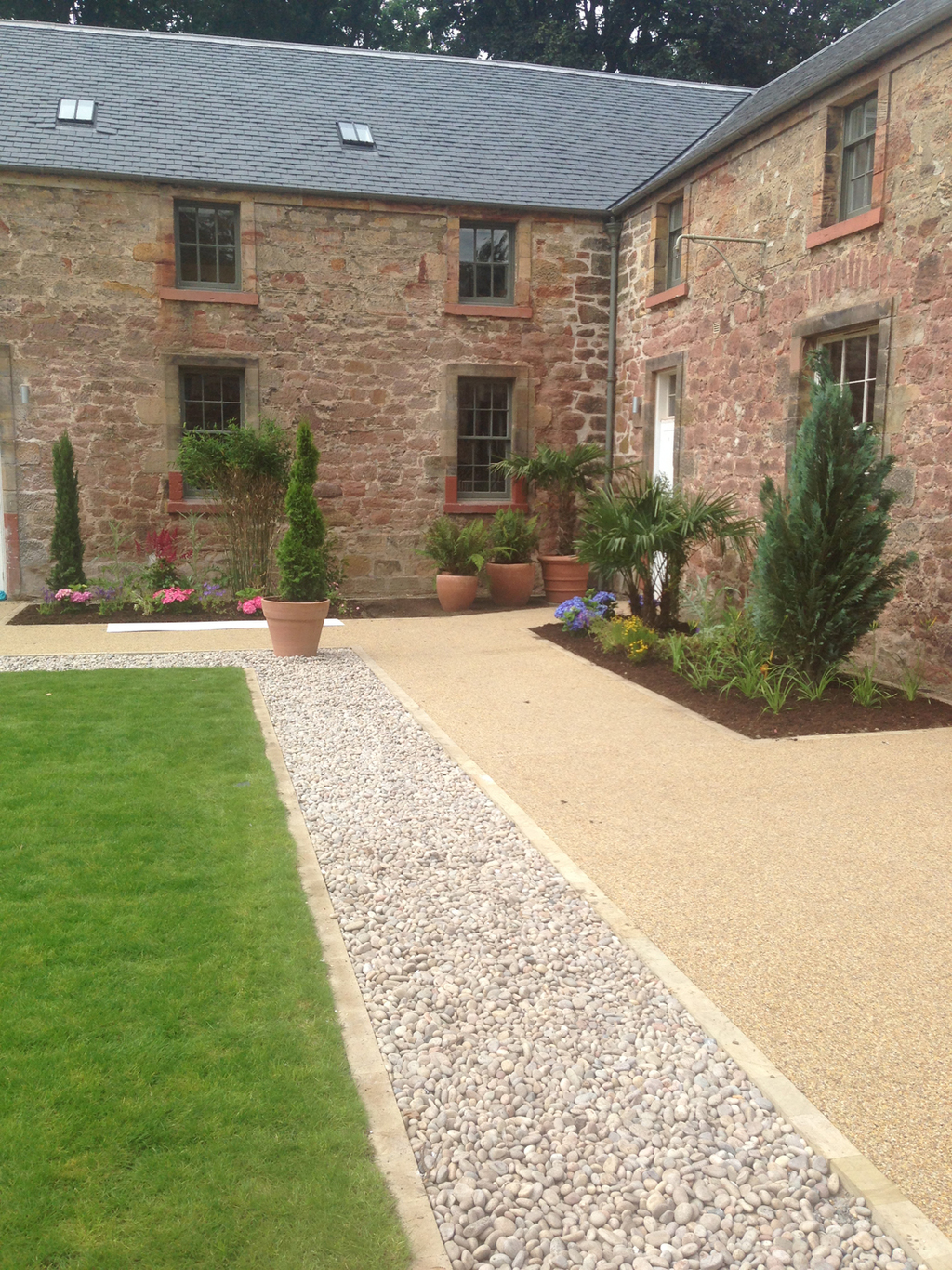 Resin bound courtyard surfacing for Scottish estate | Addagrip Terraco ...