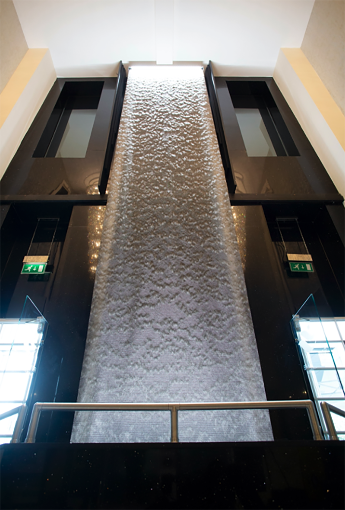 7m-tall AquaVeil® illuminated water wall for foyer | Tills Innovations ...