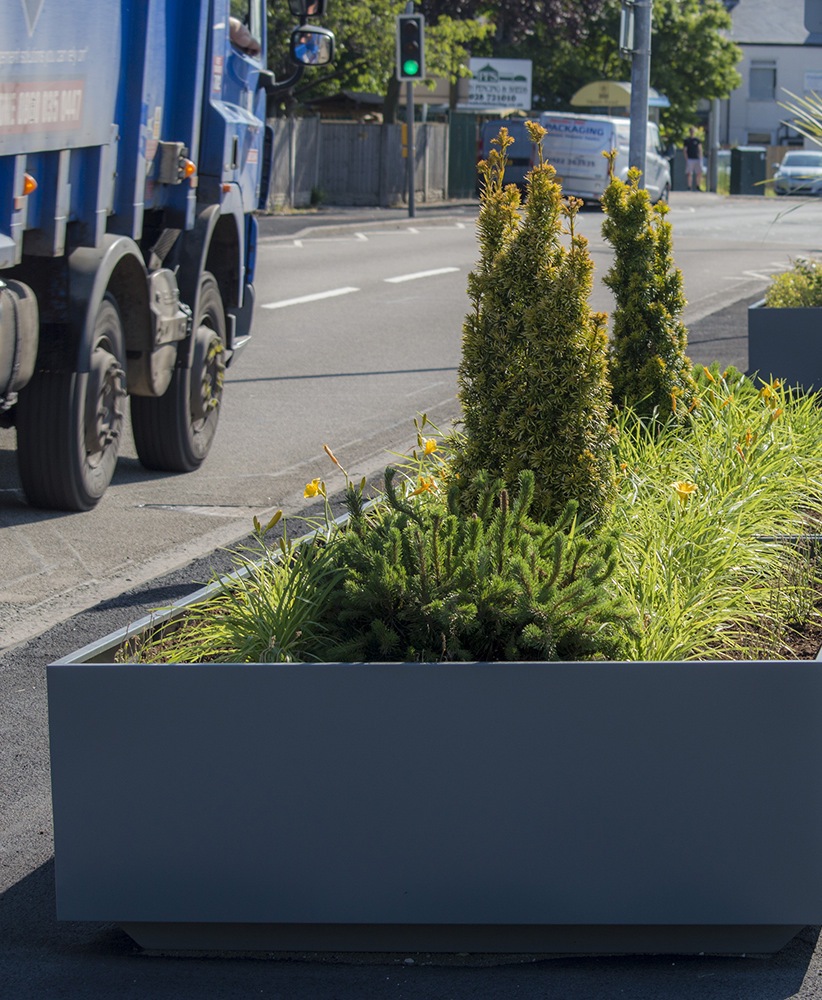 Bespoke powder-coated steel planters for highway scheme | IOTA | ESI ...
