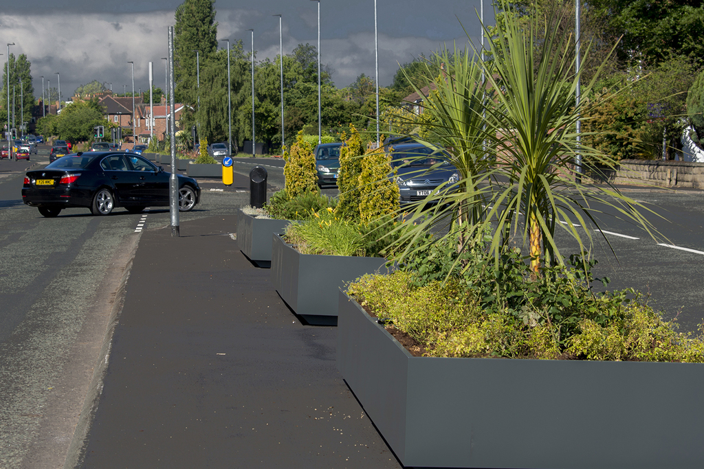 Bespoke powder-coated steel planters for highway scheme | IOTA | ESI ...