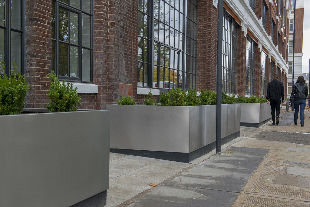 Bespoke stainless steel street planters, Shepherds Bush | IOTA | ESI ...
