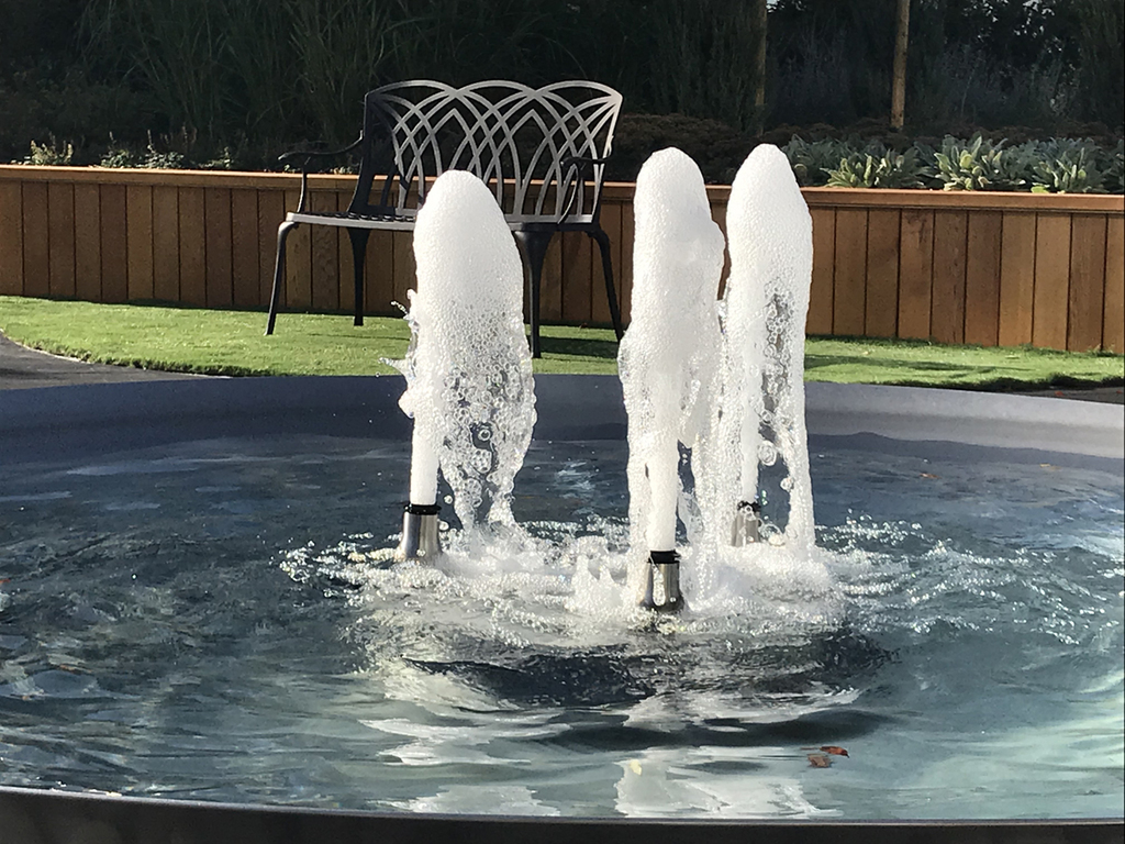 Stainless steel water feature with jets - Chelsea Island | Fountains ...