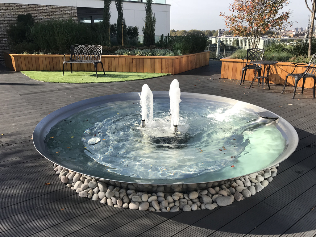 Stainless steel water feature with jets - Chelsea Island | Fountains ...