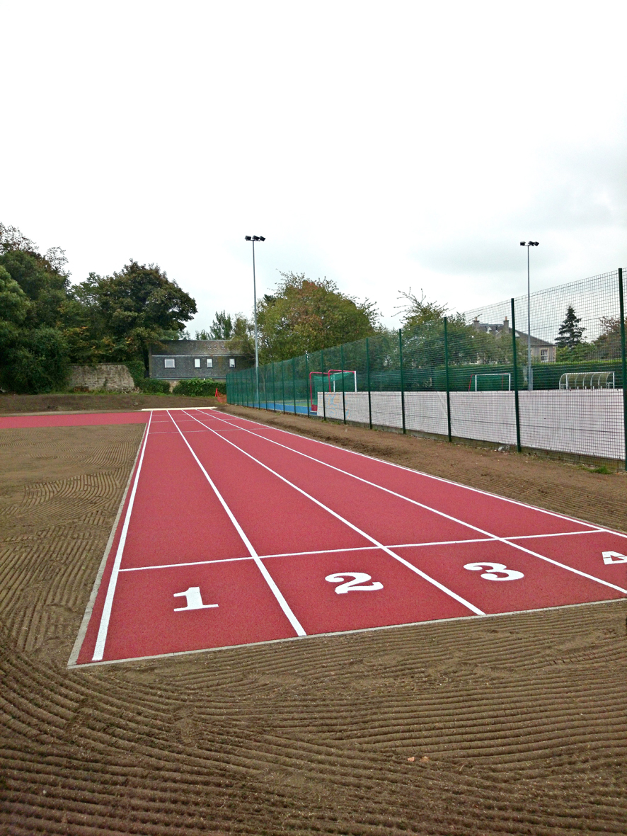 Synthetic athletics track installation | Hunter Construction (Aberdeen ...