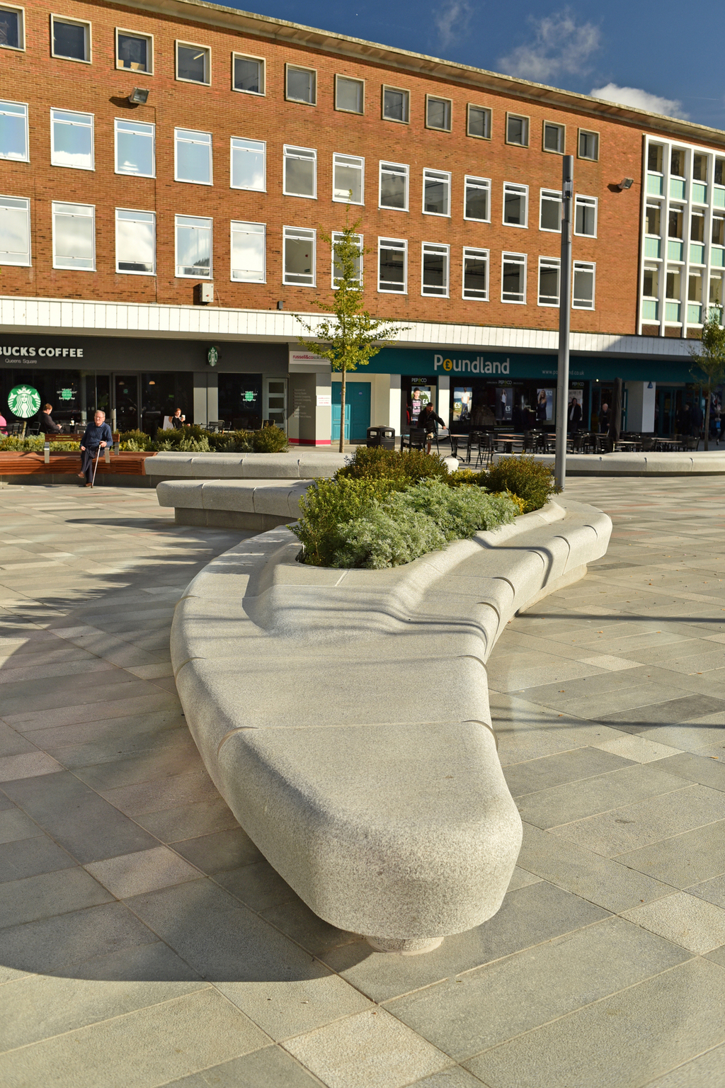 Bespoke curved granite benches revitalise town centre | Pomery Natural ...