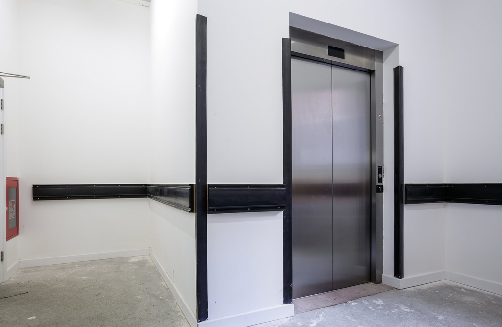 Service corridor wall protection for shopping centre | Construction ...