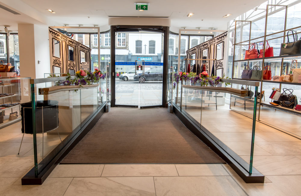 Durable, quality entrance matting for department store | Construction ...