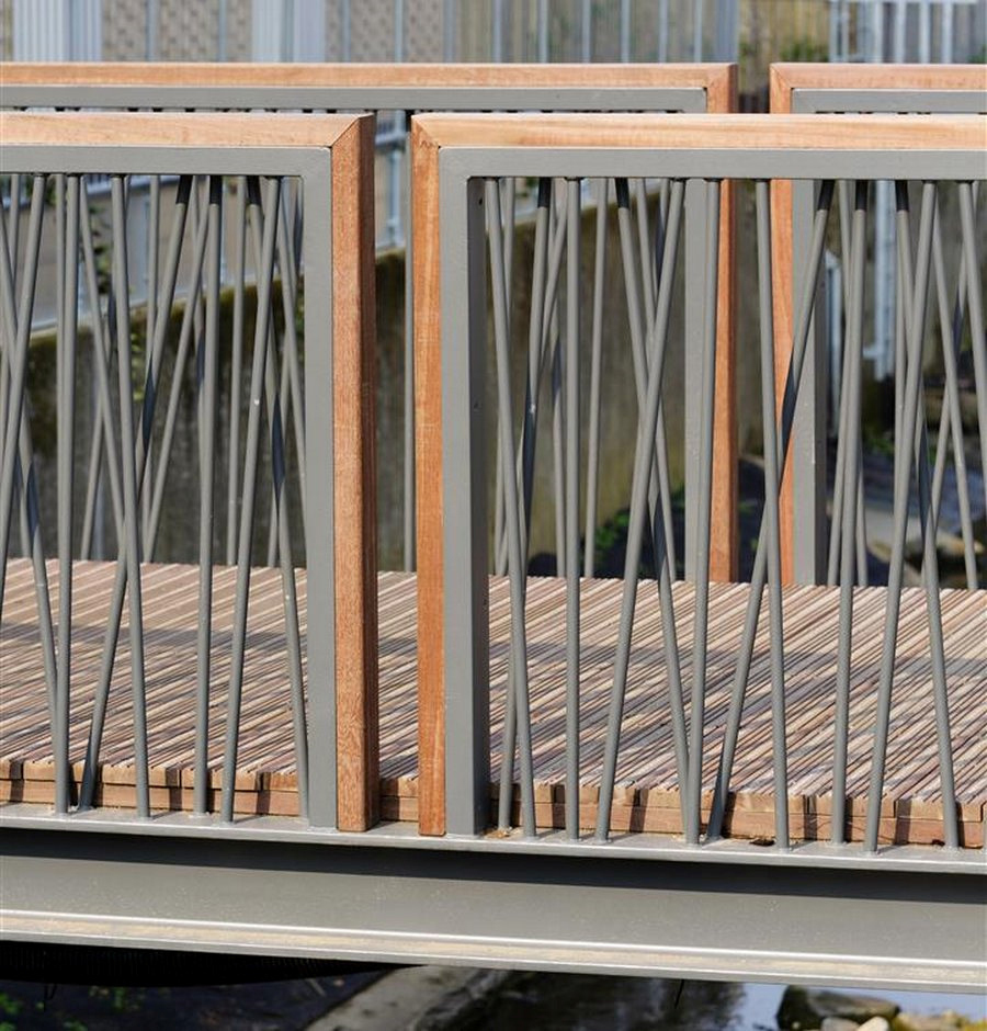 Bespoke steel and timber parapet bridge for Travelodge | CTS Bridges ...
