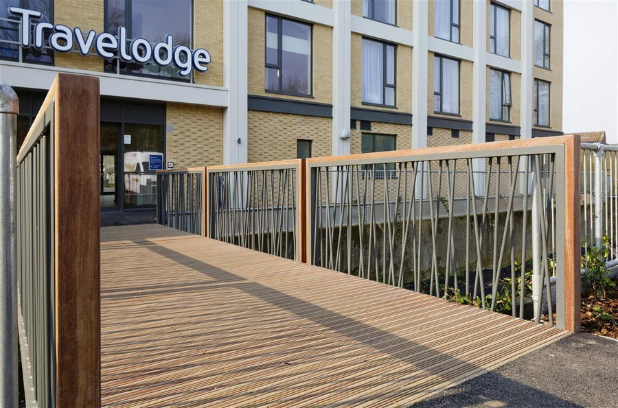 Bespoke steel and timber parapet bridge for Travelodge | CTS Bridges ...
