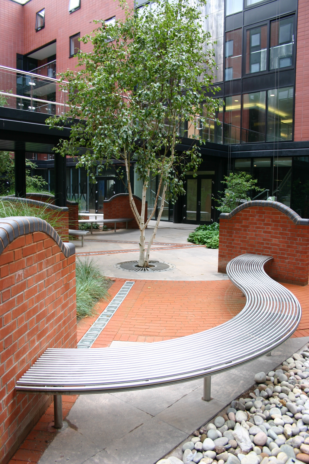 Centerline CL007 contemporary curved steel benches | Benchmark Design ...