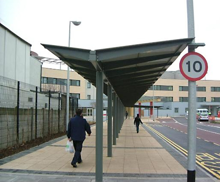 Bespoke covered passenger walkways and canopies | Trueform | ESI ...