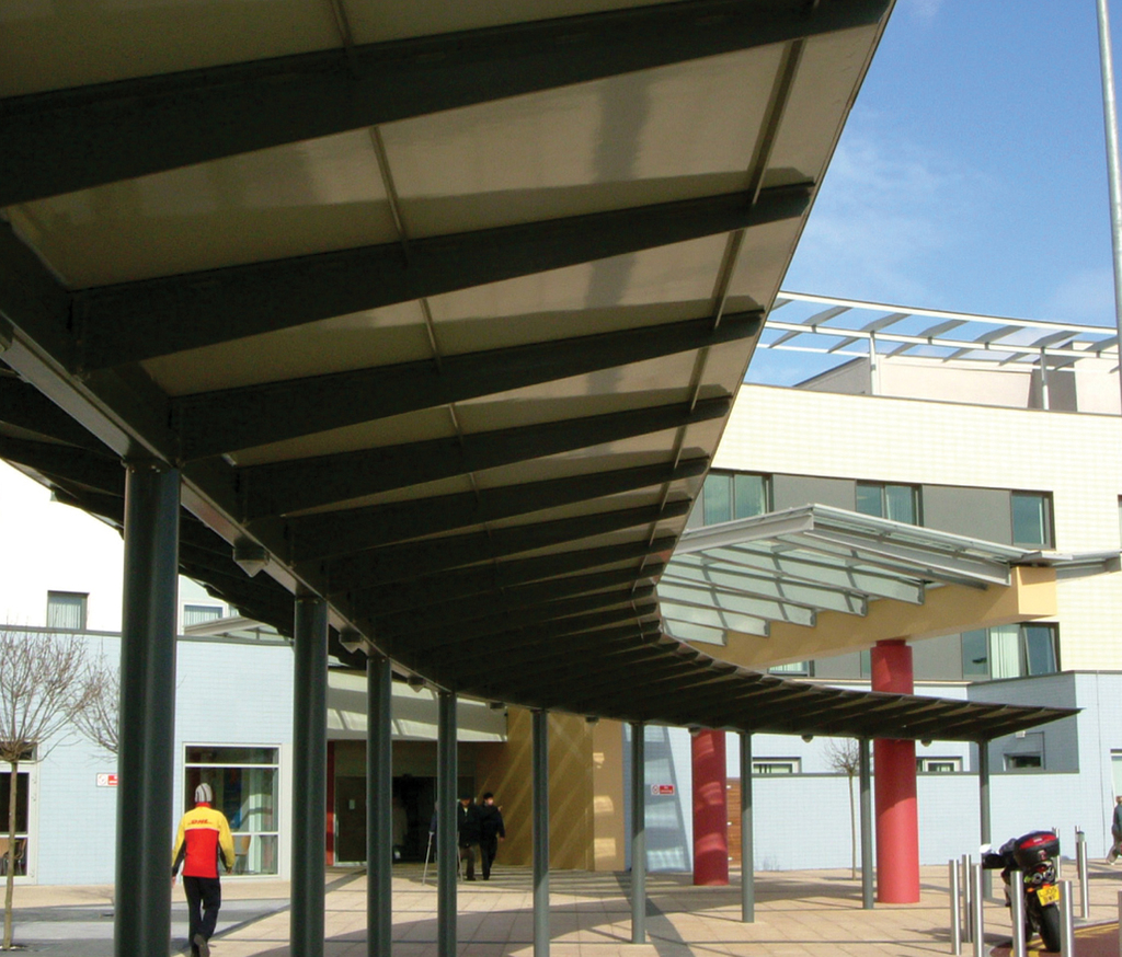 Bespoke covered passenger walkways and canopies | Trueform | ESI ...
