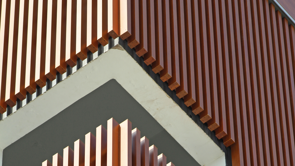 Timber cladding replaced by wood-effect aluminium system | Vulcan ...