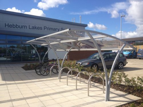 Hebburn cycle shelter with large curved canopy | Miko Shelter Solutions ...