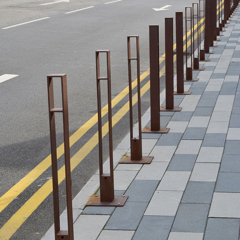 Corten steel bollards and cycle stands for retail park | Artform Urban ...