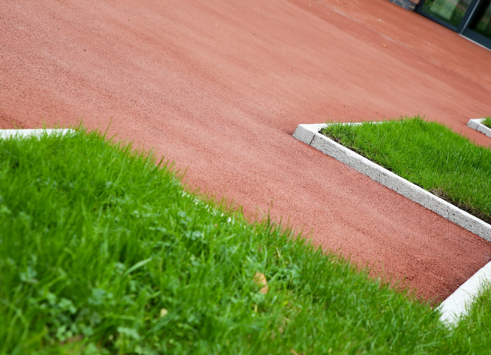 Terracotta surfacing creates vibrant pathways in park | NatraTex | ESI ...