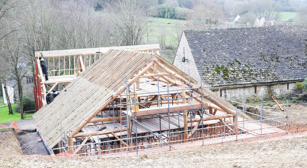 Bespoke roundwood T-shaped barn for weddings and events | Roundwood ...