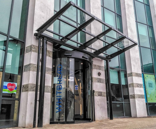 Cambridge bolted glass covered walkway | Clovis Canopies | ESI External ...