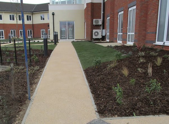 Resin bonded surfacing for housing development pathways | Addagrip ...