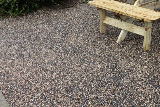 Recycled rubber and aggregate surfacing for seating area | Addagrip ...