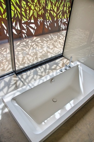Semi-sunken bath for RIBA award-winning home | Design & Form | ESI ...