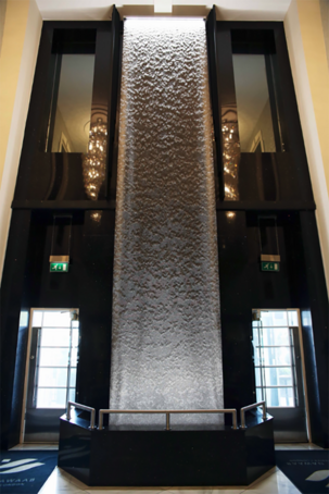 7m-tall AquaVeil® illuminated water wall for foyer | Tills Innovations ...