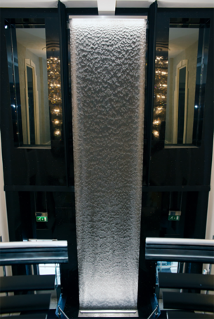 7m-tall AquaVeil® illuminated water wall for foyer | Tills Innovations ...