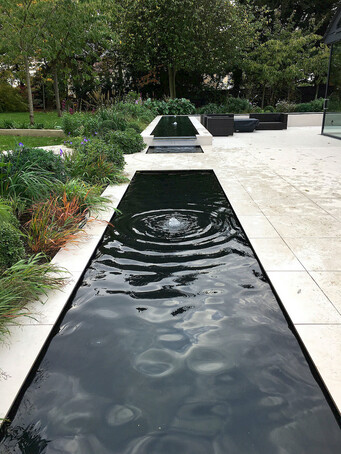 Reflection pools with fountains for private home | Tills Innovations ...