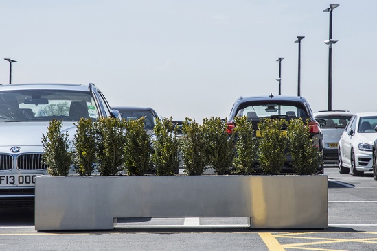 Bespoke movable steel planters for new car dealership | IOTA | ESI ...