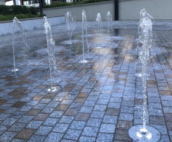 Water jets feature for riverside apartments plaza | Fountains ...