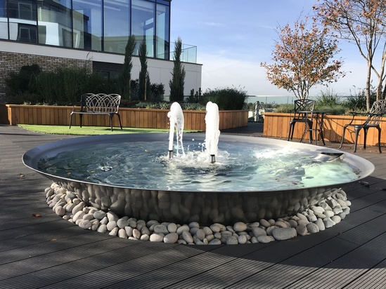 Stainless steel water feature with jets - Chelsea Island | Fountains ...