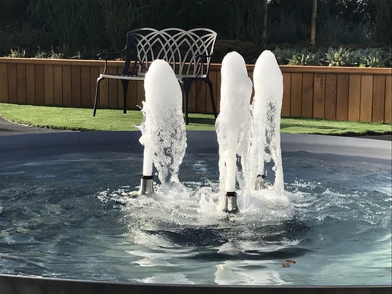 Stainless steel water feature with jets - Chelsea Island | Fountains ...