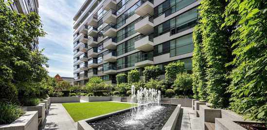 Illuminated table-top clock fountain - One Tower Bridge | Fountains ...