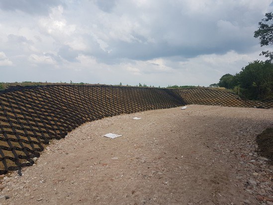 Erosion control for a steep sloped bund in Warwickshire | Greenfix Soil ...
