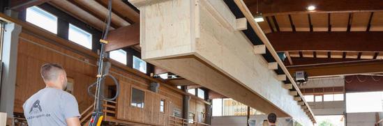 Kerto LVL roof beams for indoor swimming pool | Metsä Wood UK | ESI ...