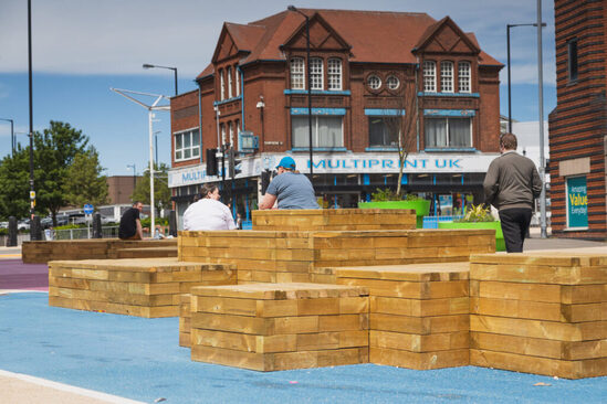Modular tiered timber block seating for public square | WoodBlocX | ESI ...