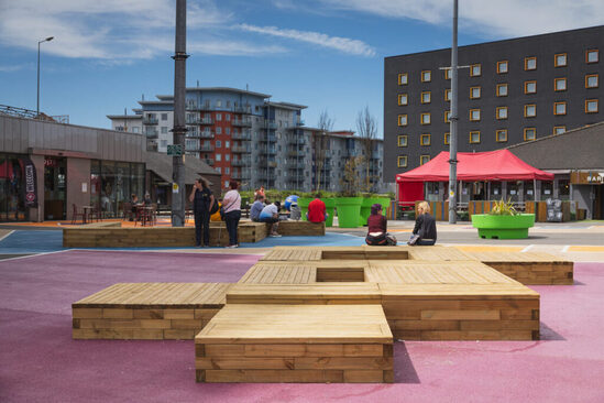 Modular tiered timber block seating for public square | WoodBlocX | ESI ...