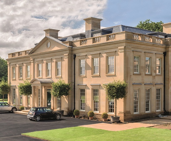 Period style manor house uses buff sandstone ashlar | Marshalls | ESI ...