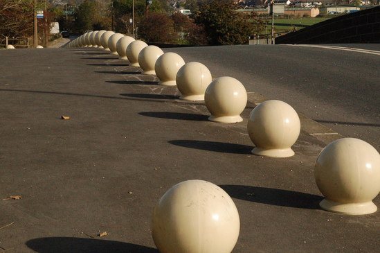 Recycled spherical bollards over The River Aire | Architectural Street ...