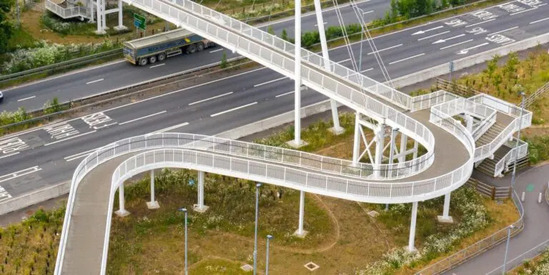 Steel cable stay footbridge over A45 at Rushden Lakes | Nusteel ...