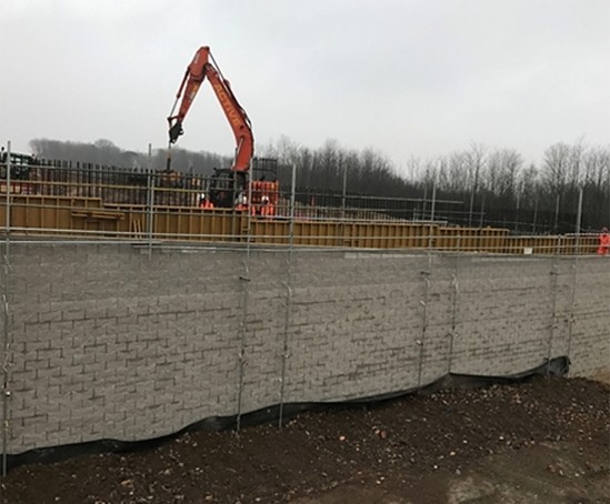 Retaining wall and reinforced soil slope for A21 road | Phi Group | ESI ...