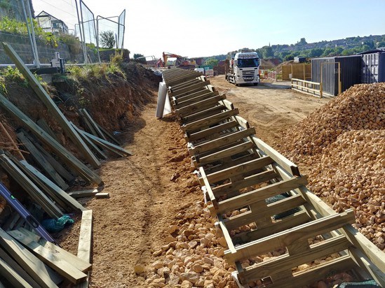 Timber crib wall and steps for premium housing site | Phi Group | ESI ...
