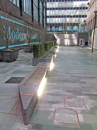 Lighting columns and bespoke seating - NOMA public realm | Woodscape | ESI External Works