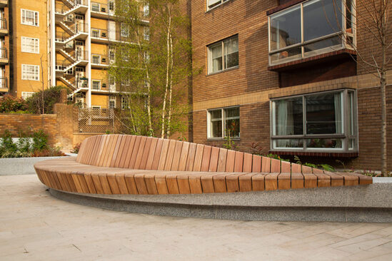 Bespoke curved timber and granite seating - Halkin Arcade, London ...