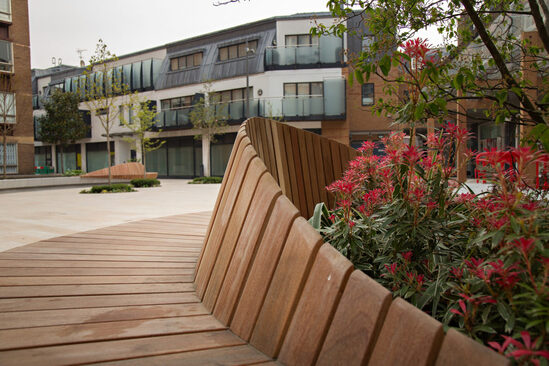 Bespoke curved timber and granite seating - Halkin Arcade, London ...