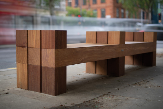 Beam timber benches line Kensington High Street | Woodscape | ESI ...
