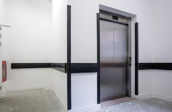 Service corridor wall protection for shopping centre | Construction ...