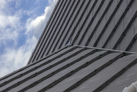 Interlocking roof tiles for new housing development | Marley | ESI ...