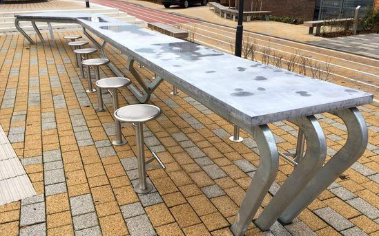 Stainless steel bar stools for outdoor cooking area | Benchmark Design ...